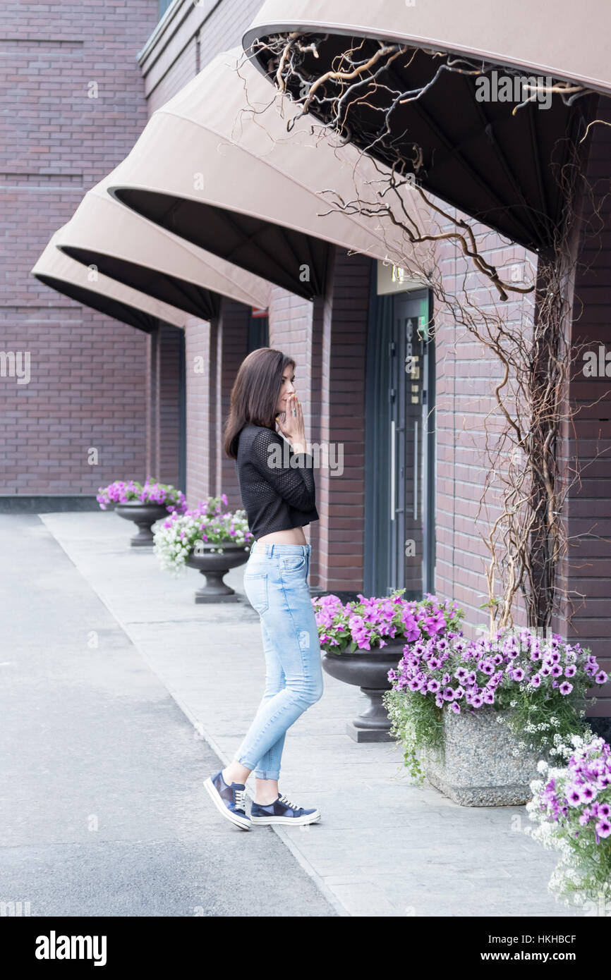 Woman at the shop window Stock Photo - Alamy
