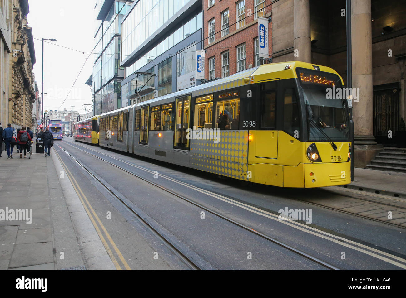 Metrolink tram passing through Manchester Street Stock Photo - Alamy