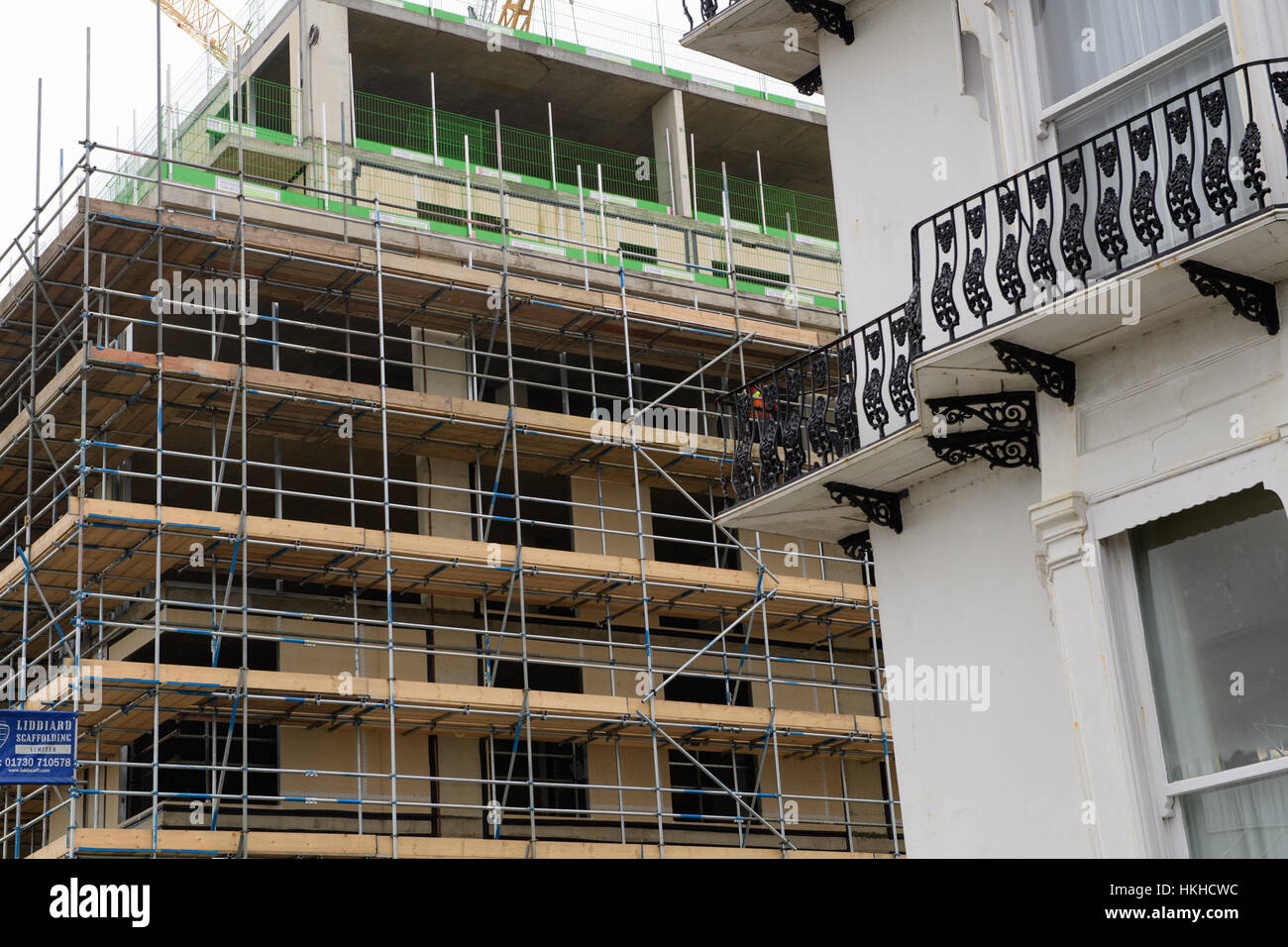 scaffolding around building during construction Stock Photo - Alamy