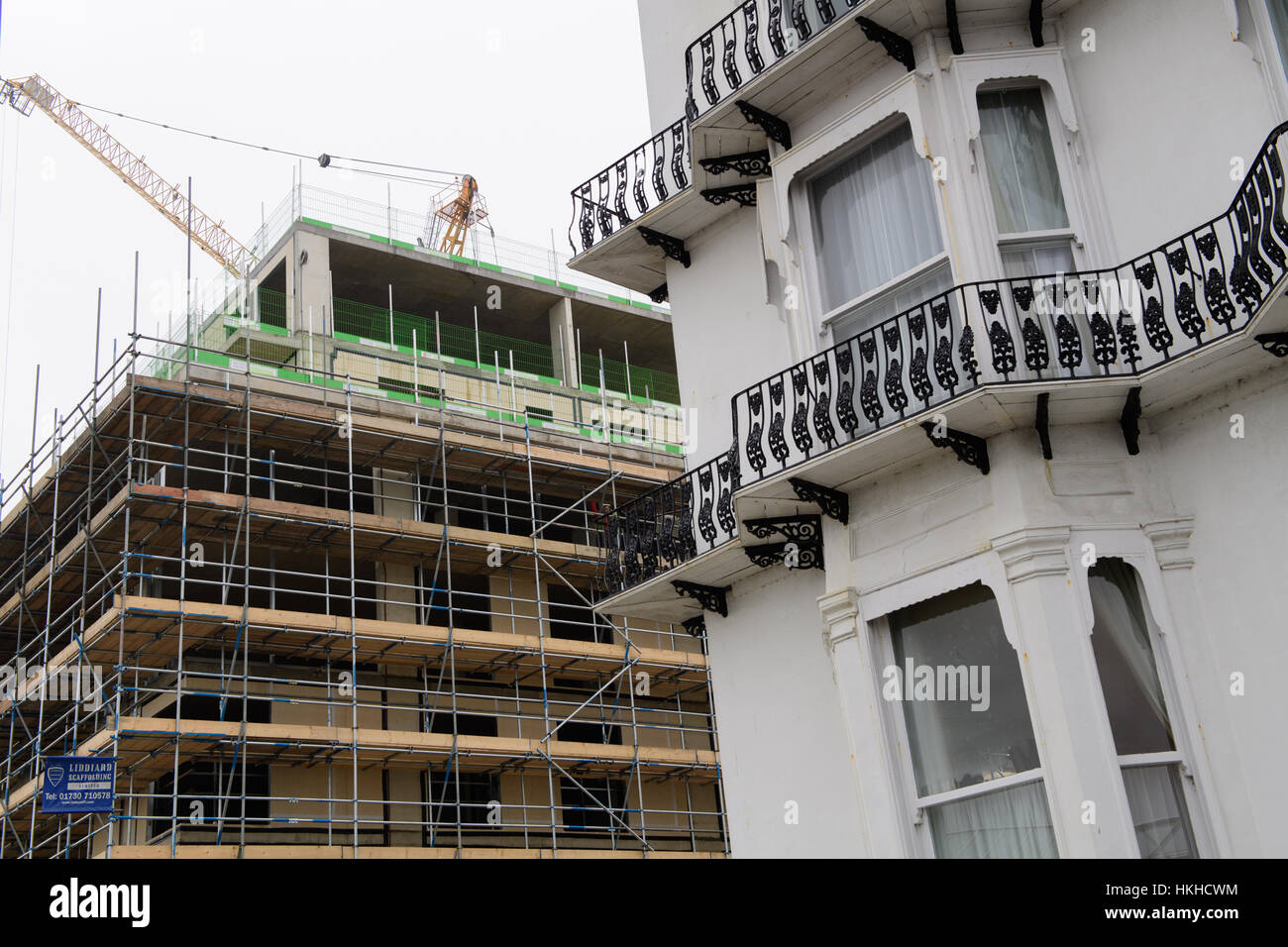 scaffolding around building during construction Stock Photo - Alamy
