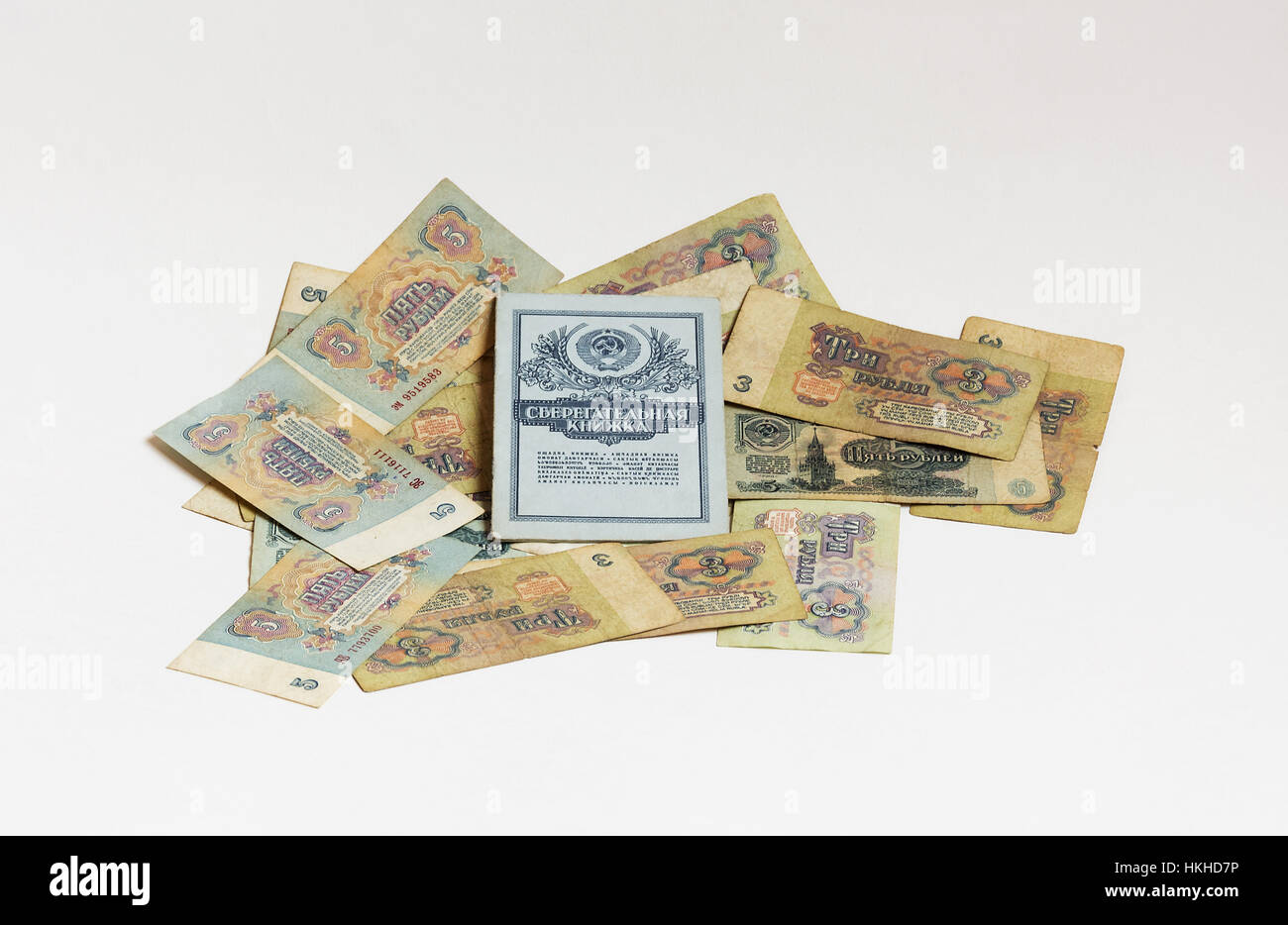 Soviet rubles and savings book of the Soviet era are on a light ...