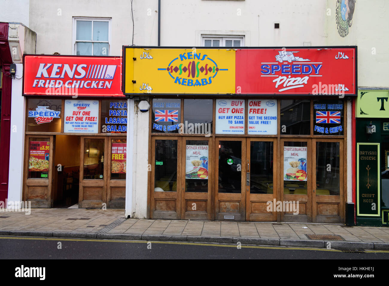 Fried chicken, pizza, kebab takeaway shop, UK Stock Photo - Alamy