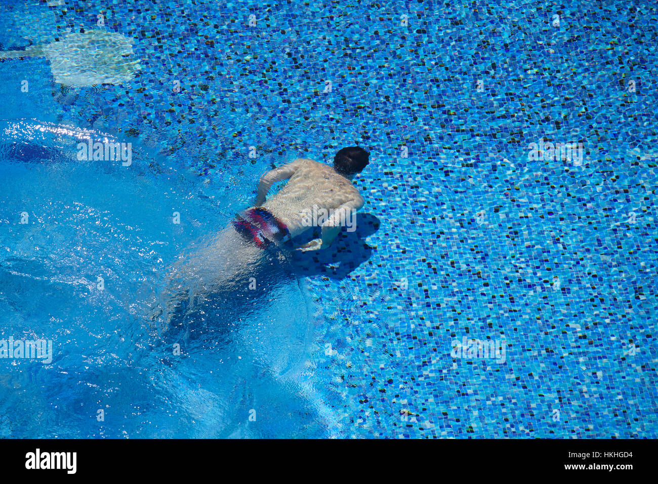 Man swimming underwater pool hi-res stock photography and images - Alamy