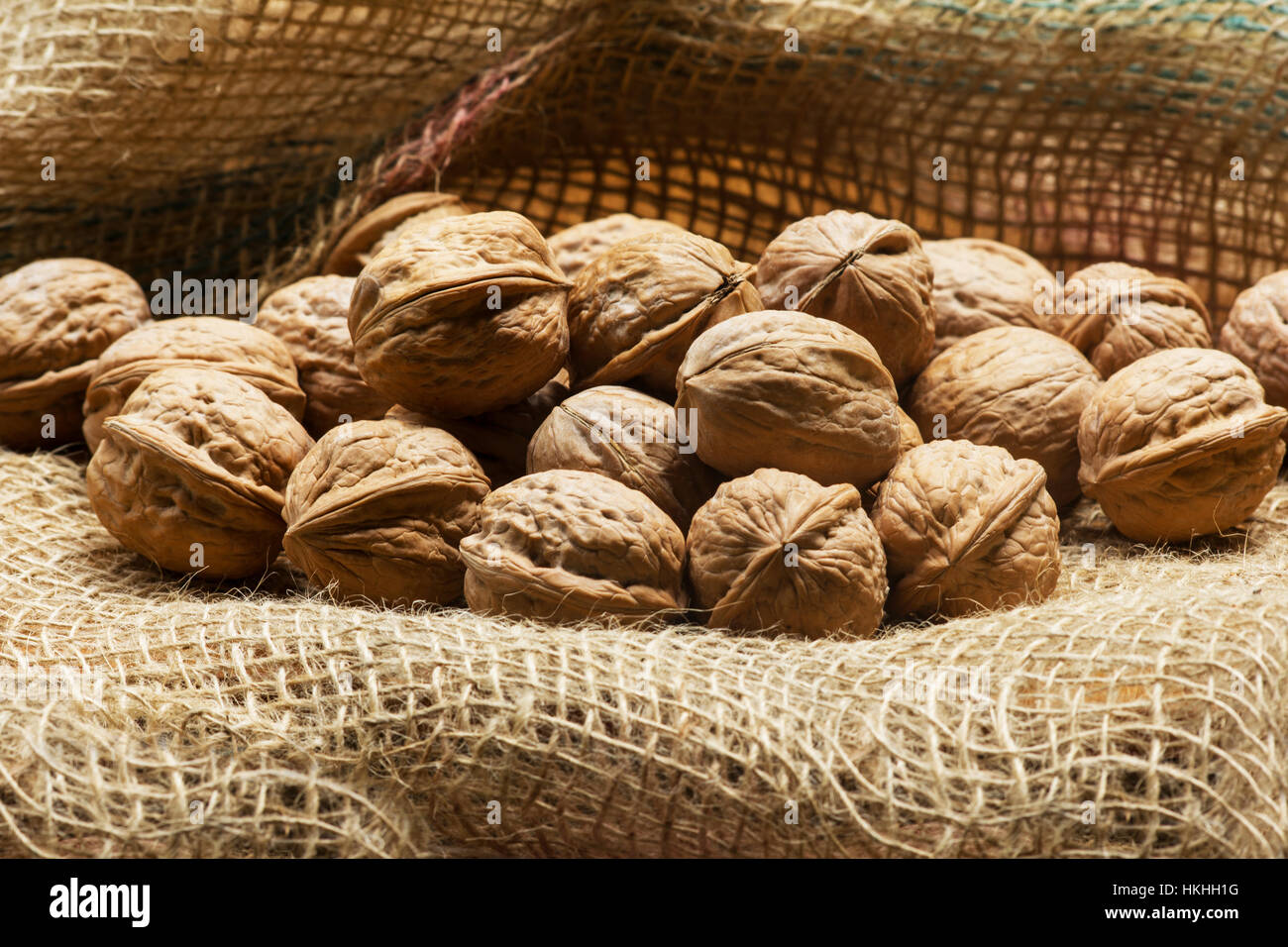 Walnuts on burlap Stock Photo - Alamy