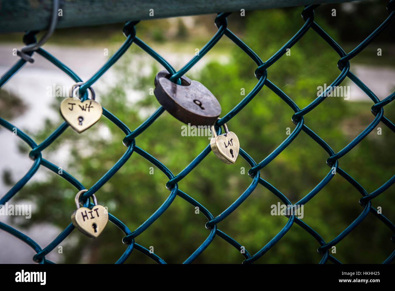 Wire fence with heart shaped locks. Romantic remembrance, memory Stock ...