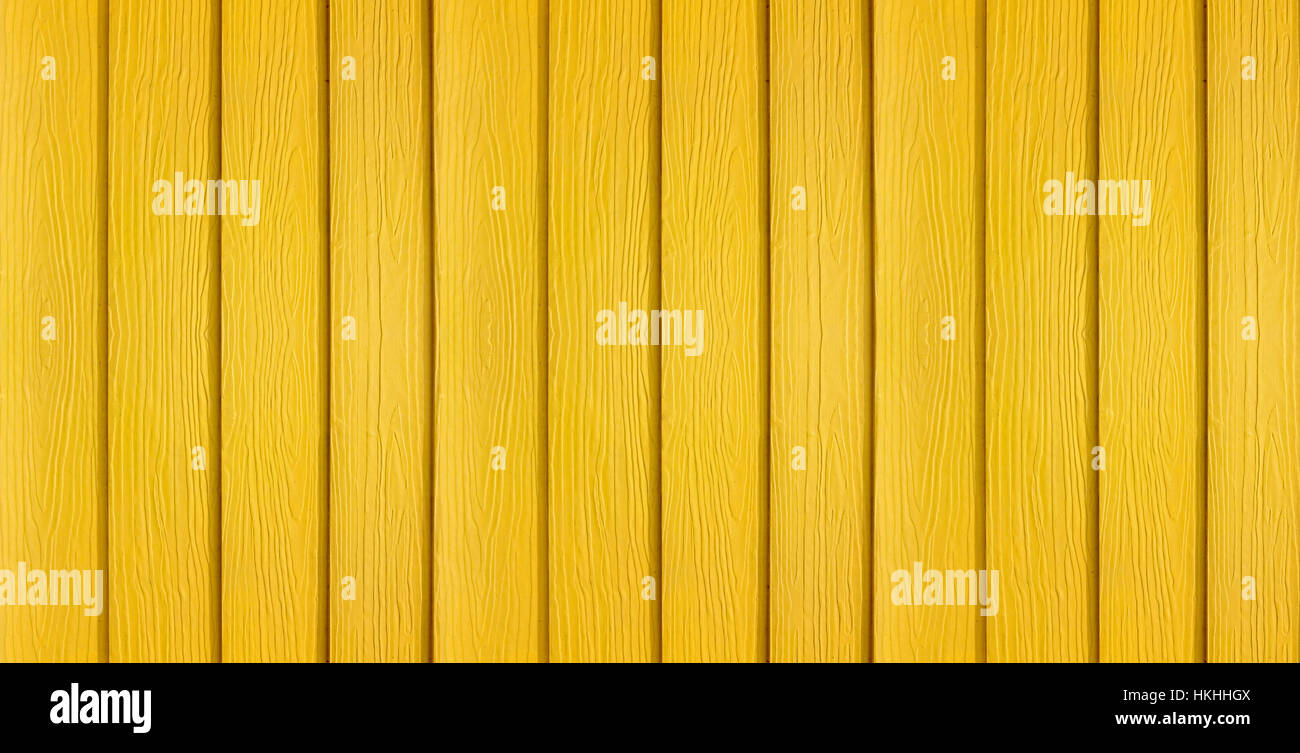 A banner background made of yellow painted wood Stock Photo - Alamy