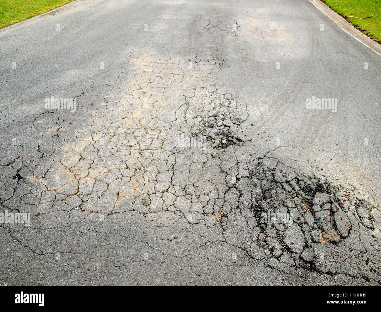 Old asphalt road with cracks Stock Photo - Alamy