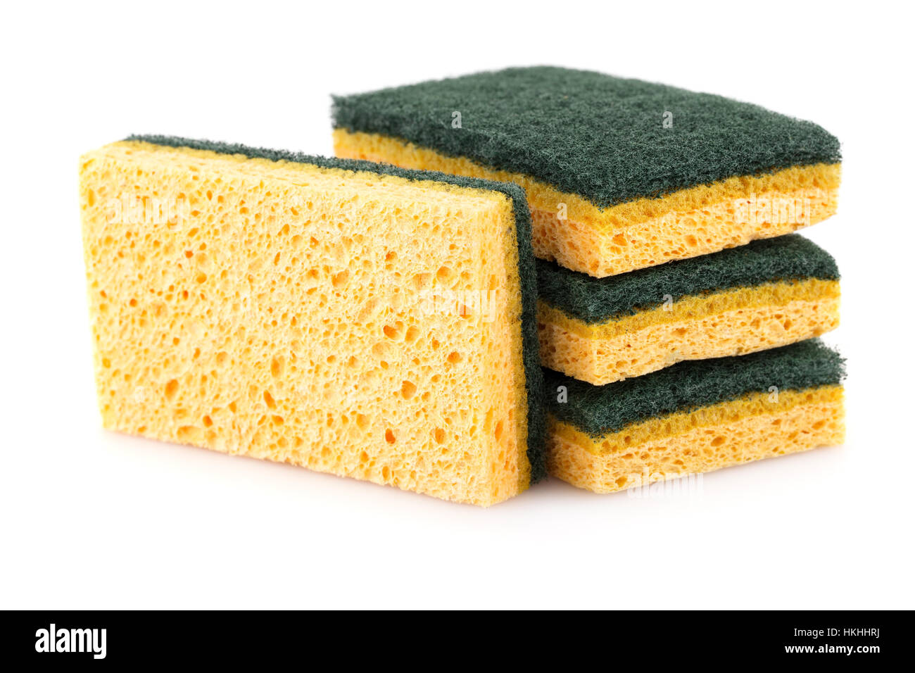 Stack of sponges isolated on white background Stock Photo - Alamy