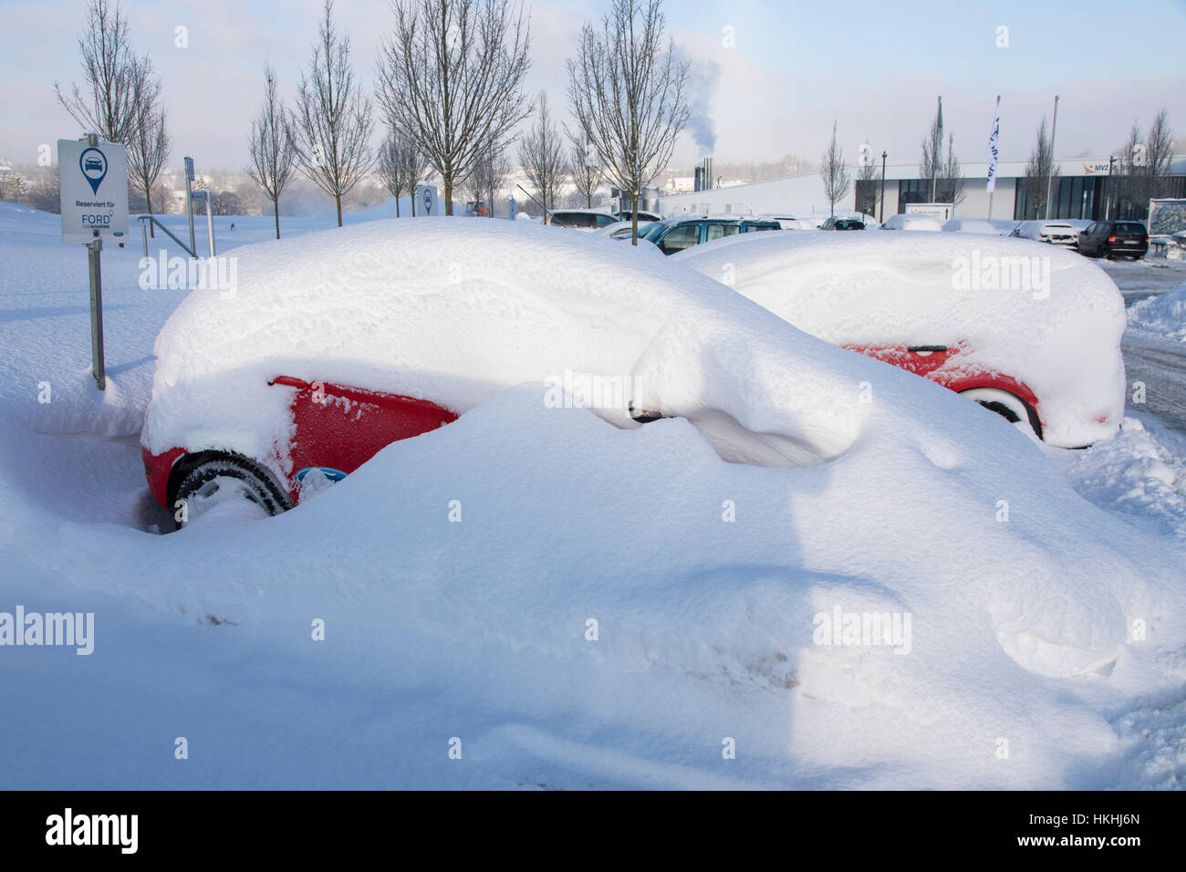 Winter in the Sauerland, NRW, carved cars in a parking lot, Germany ...