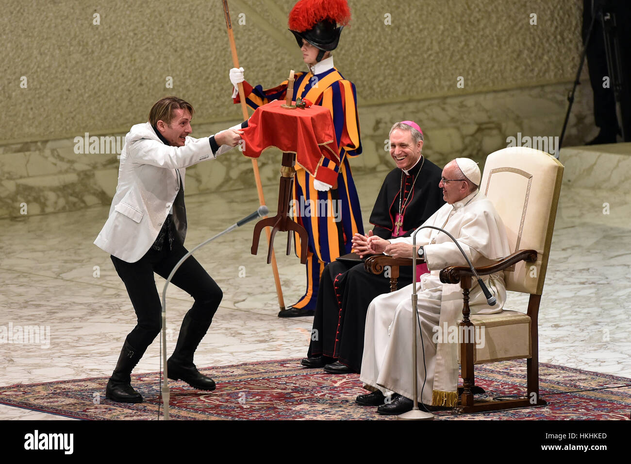 Pope Francis looks at a performance of a member of the Golden Circus in ...