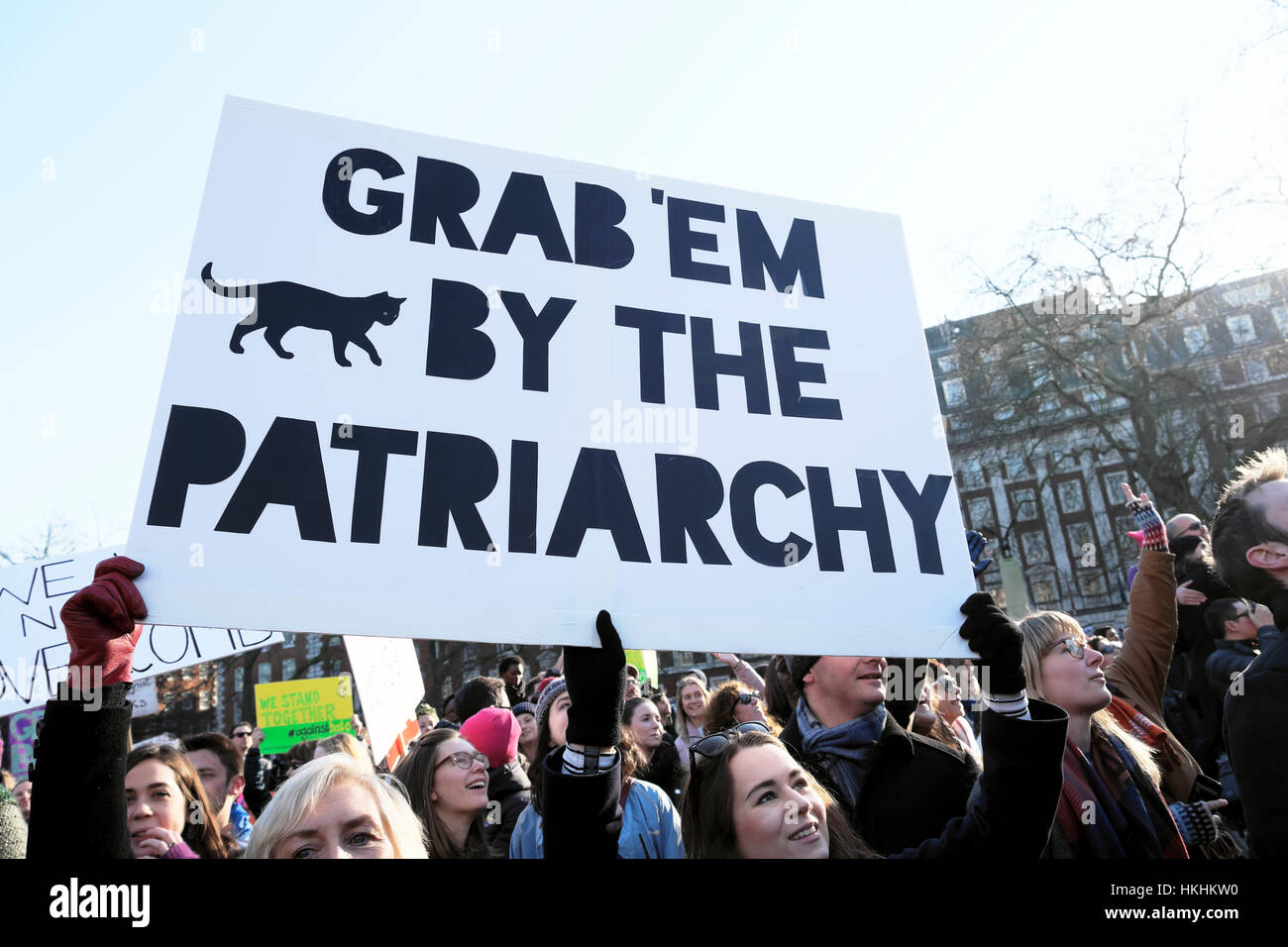 "Grab 'Em By The Patriarchy" placard protestors at the Women's March ...