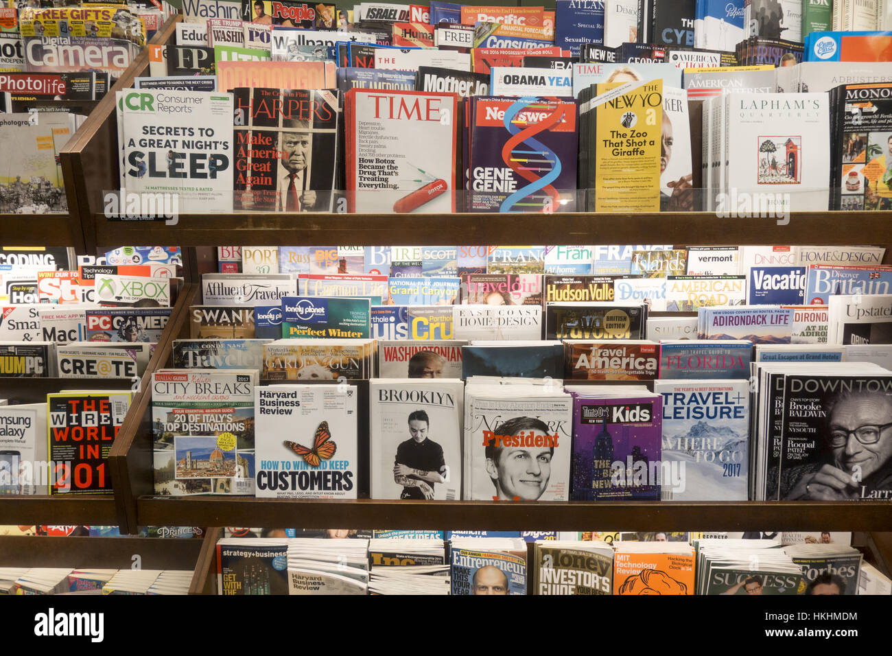 Full magazine racks in a store show that print is not dead. New York ...
