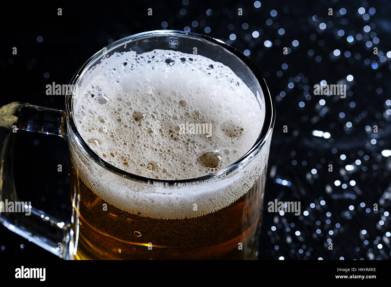 close up Beer glass on black sparkle background Stock Photo - Alamy