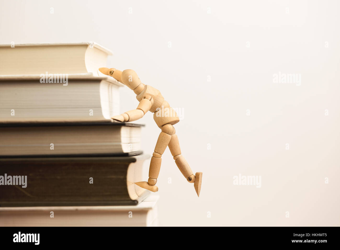 Climbing the ladder of knowledge Stock Photo - Alamy
