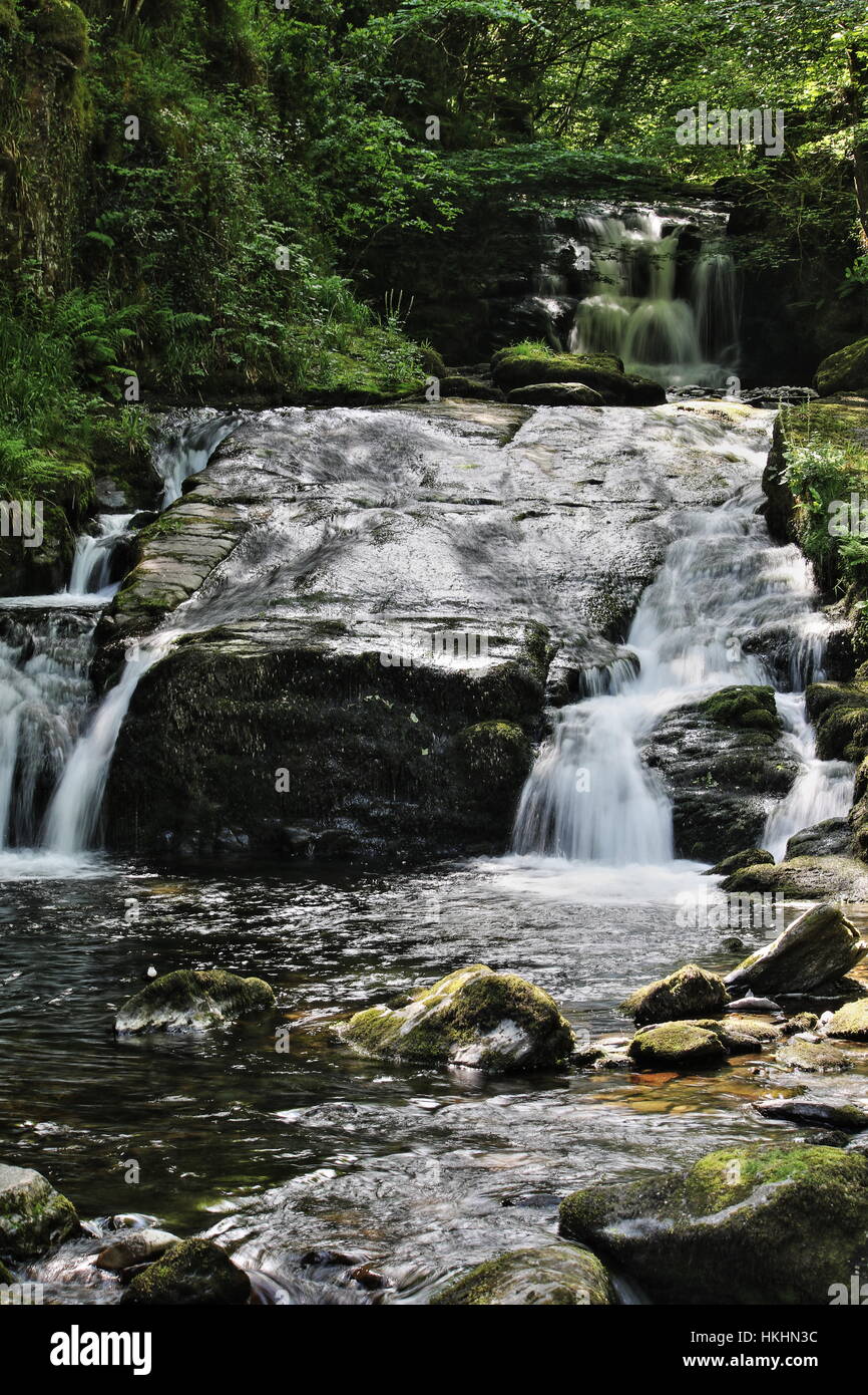 Waterfalls at Watersmeet where the East Lyn River and Hoaroak Water ...
