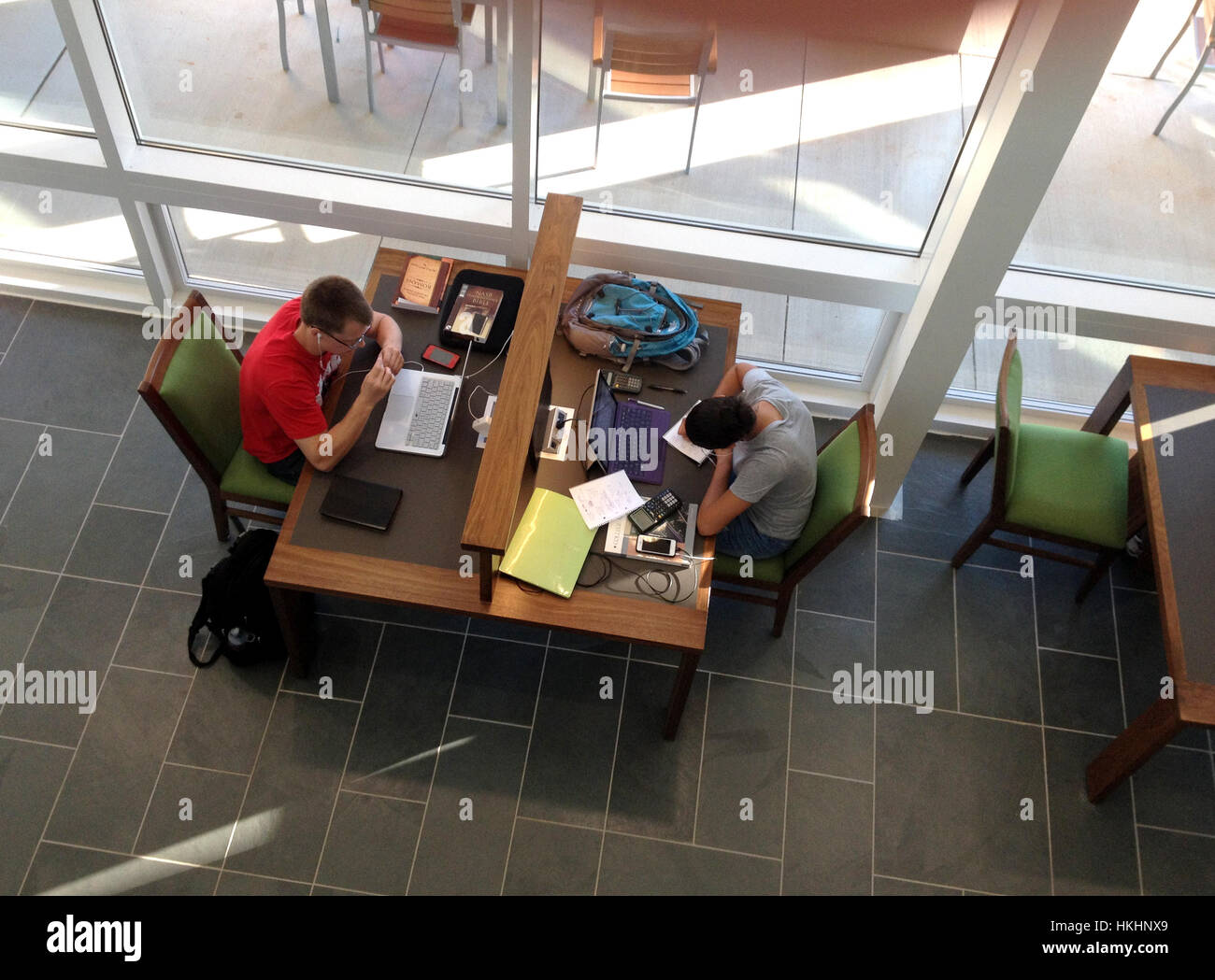 Students studying in college library Stock Photo - Alamy