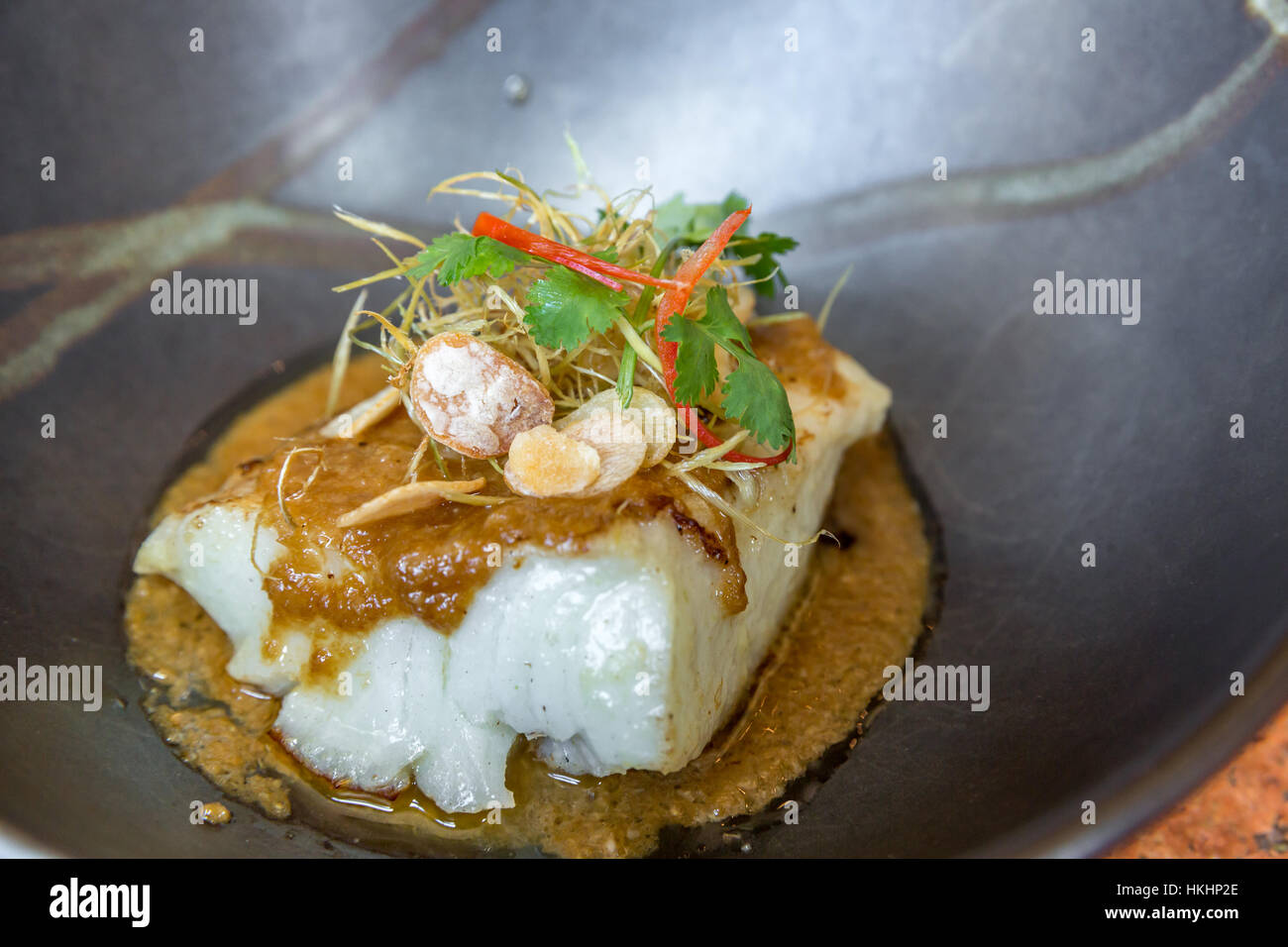 grilled snow fish with lemon grass sauce Stock Photo - Alamy