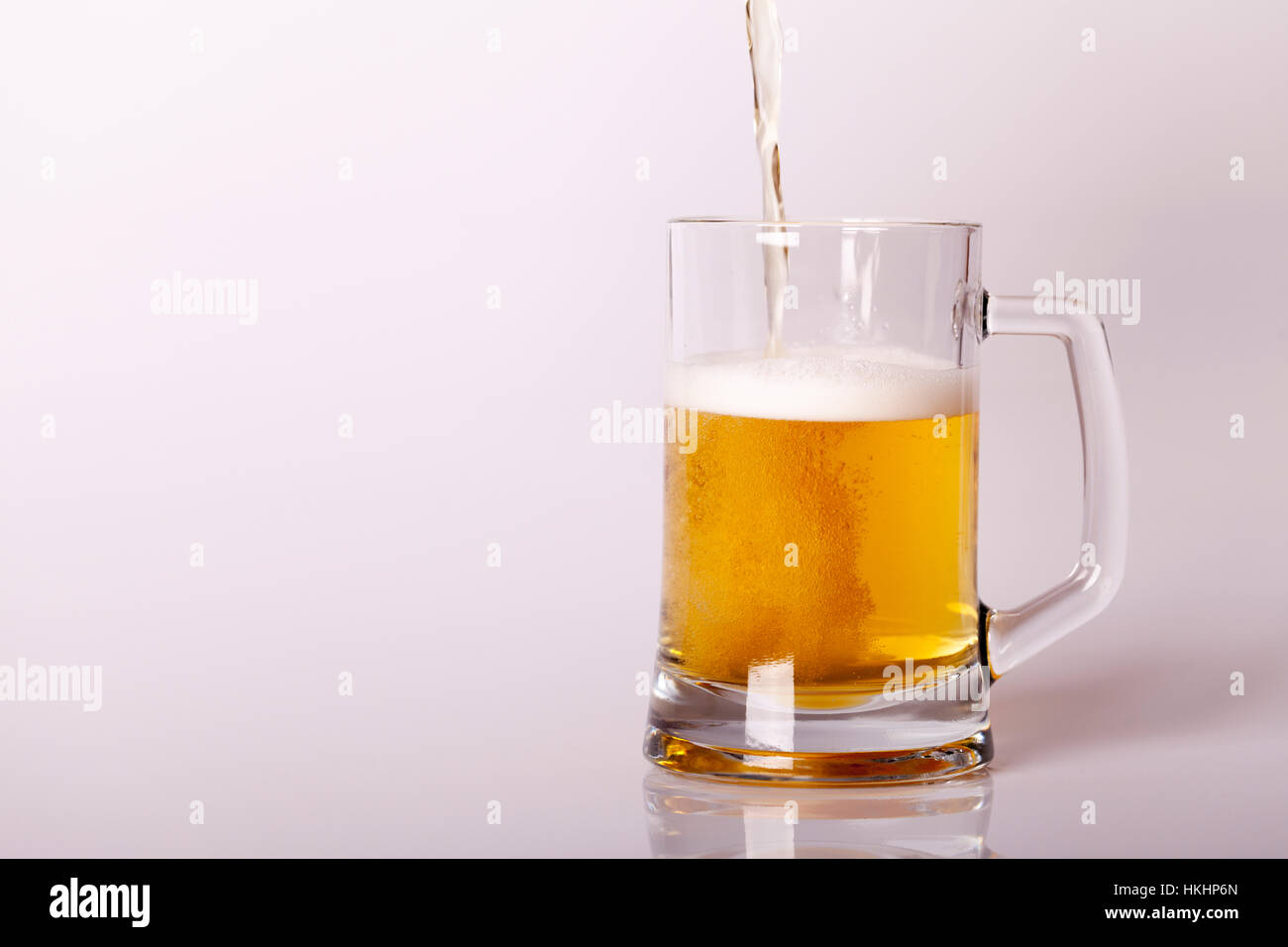 Beer on the table, Selective focus and small depth of field, lens flare ...
