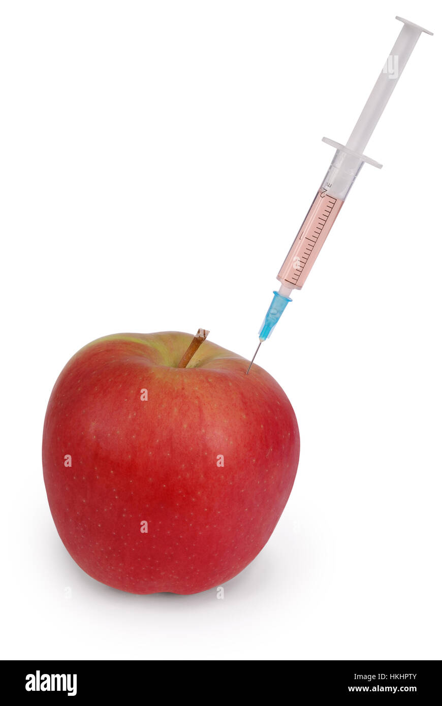 In apple stuck a syringe. Genetically modified food. Clipping path ...