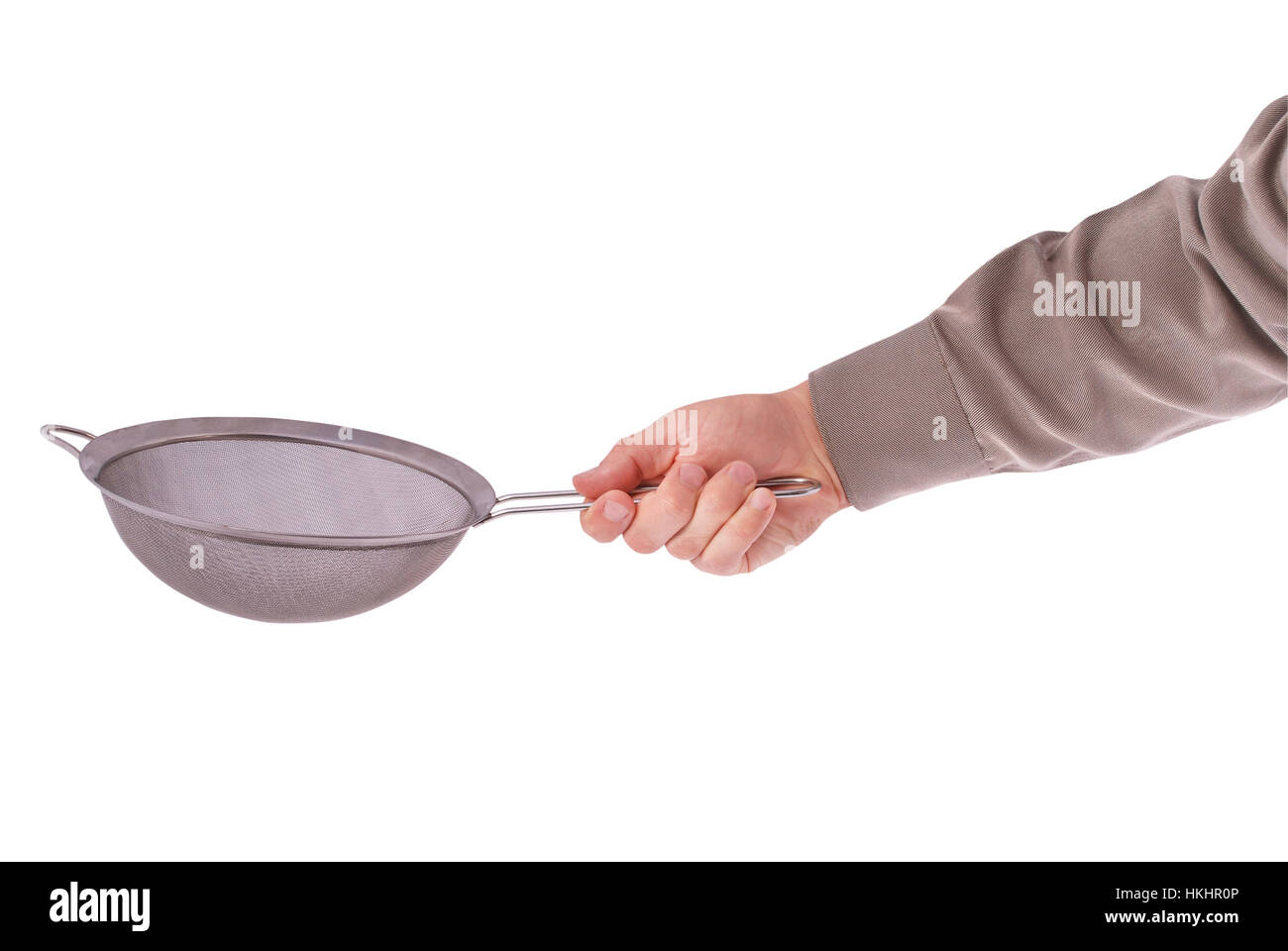 Metal colander in hand on a white. Clipping path inside Stock Photo - Alamy
