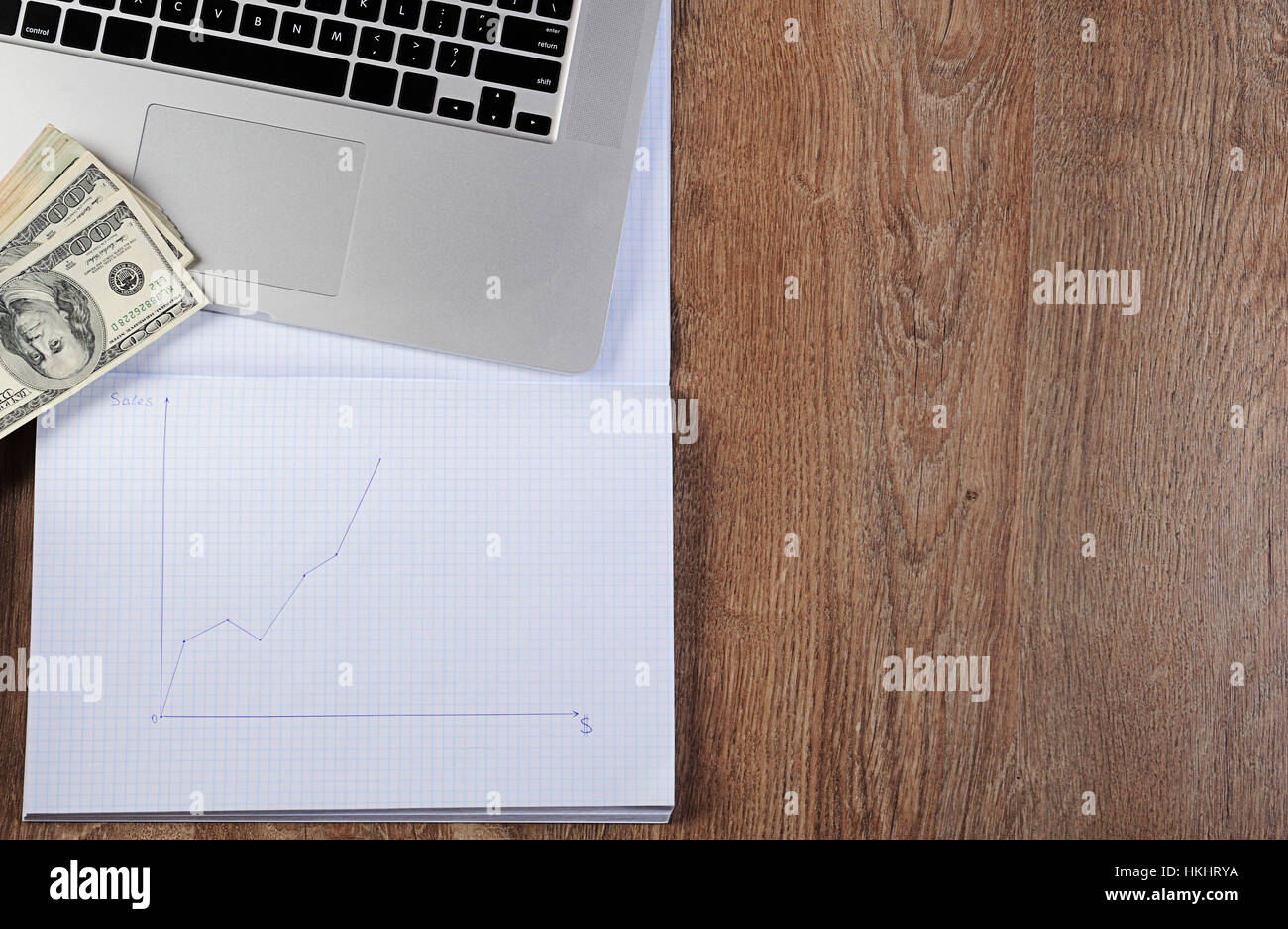 grow graph notebook with schedule diagram dollars money laptop on wood ...