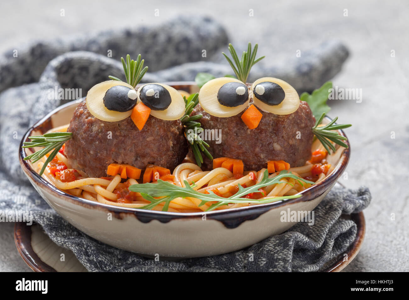 Pasta spaghetti with funny meatballs for kids. Birds in nests Stock ...