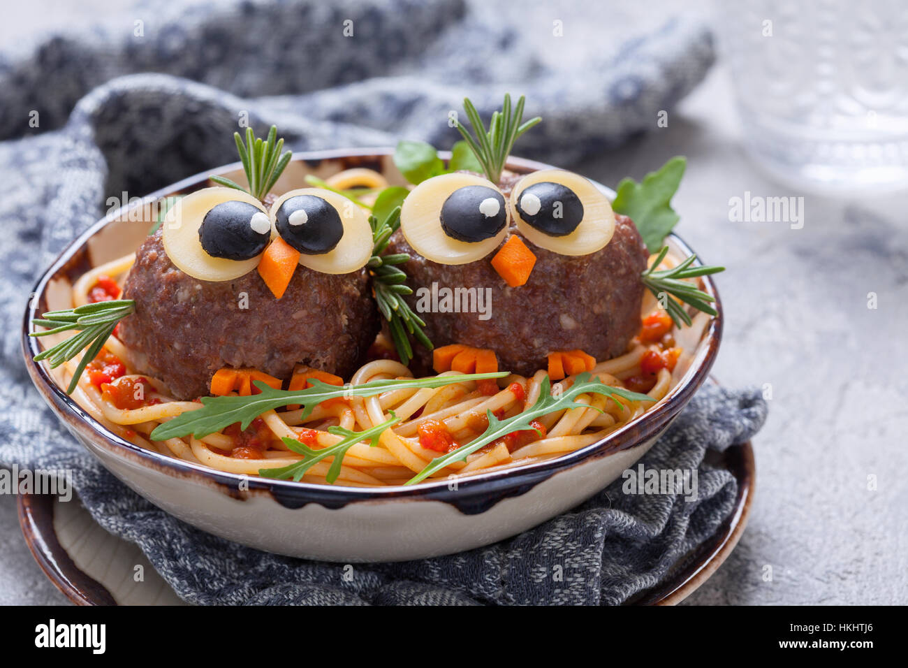 Pasta spaghetti with funny meatballs for kids. Birds in nests Stock ...