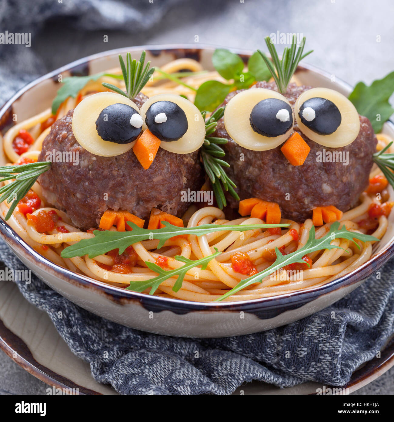 Pasta spaghetti with funny meatballs for kids. Birds in nests Stock ...