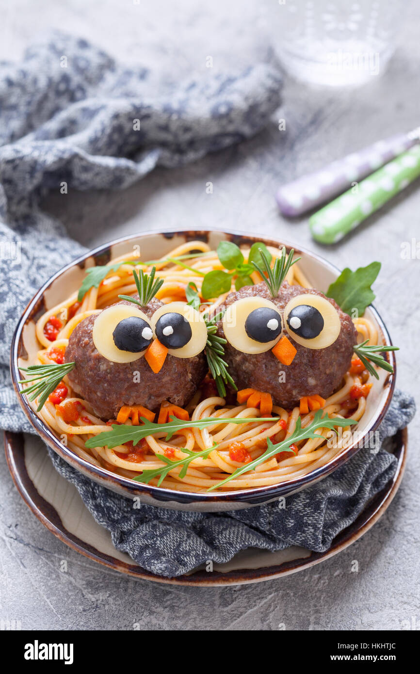 Pasta spaghetti with funny meatballs for kids. Birds in nests Stock ...