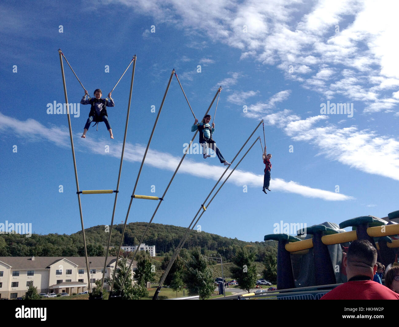 Children bungee jumping Stock Photo - Alamy