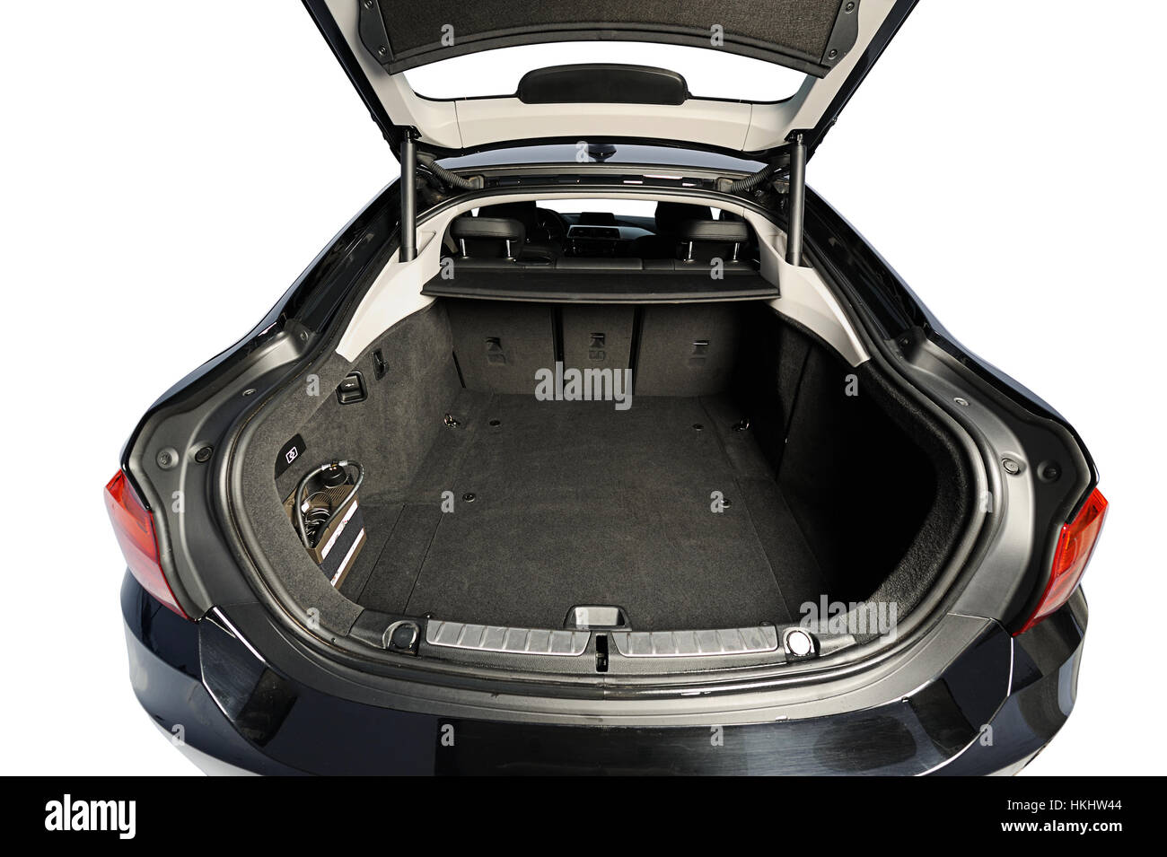 modern car empty trunk wide open isolated on white Stock Photo - Alamy