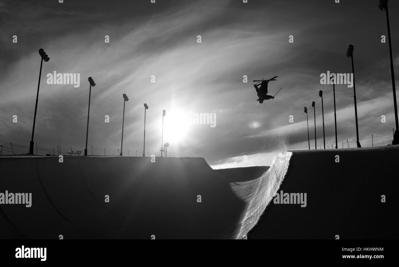 Skier doing an inverted trick in winter snow halfpipe Stock Photo - Alamy