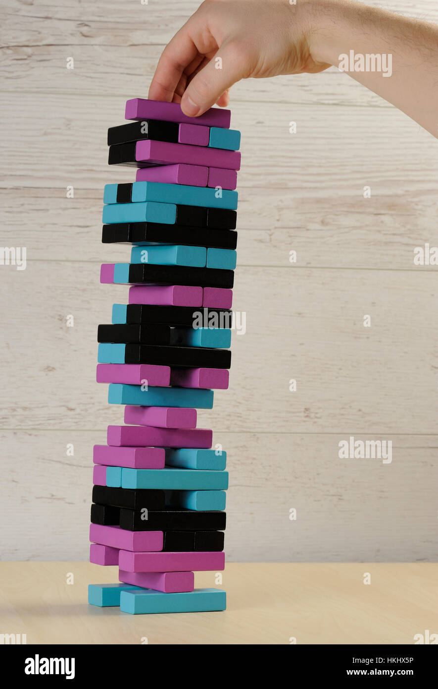 jenga tower color brick game on wood table Stock Photo - Alamy