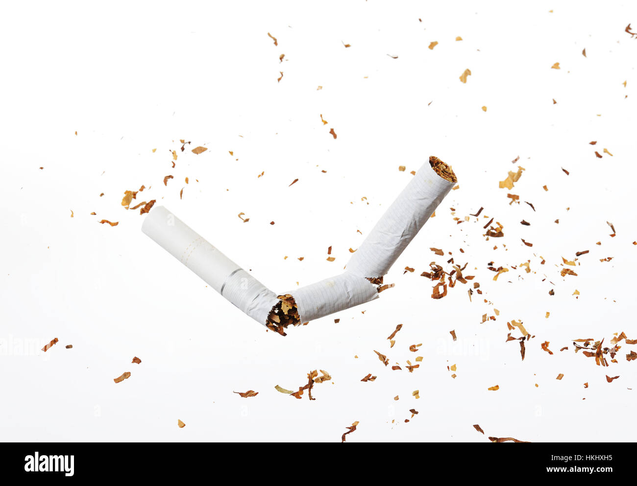 broken on half cigarette isolated on white background Stock Photo - Alamy