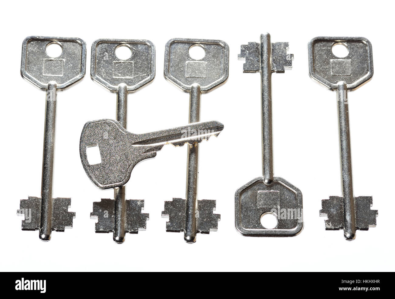 silver metal keys isolated on white background Stock Photo - Alamy