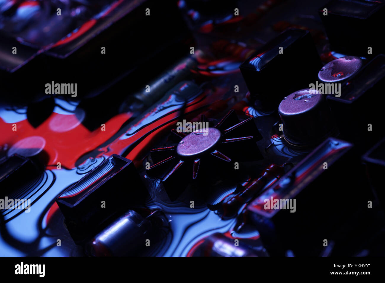 Closeup of electronic hardware. assembly on the circuit board with red ...