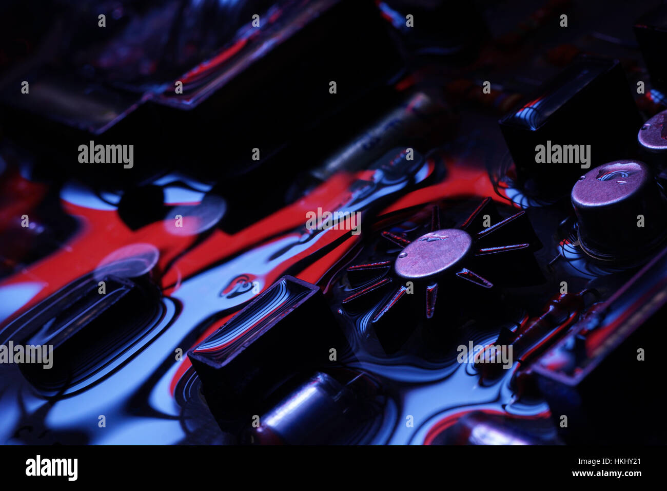 Closeup of electronic hardware. assembly on the circuit board with red ...