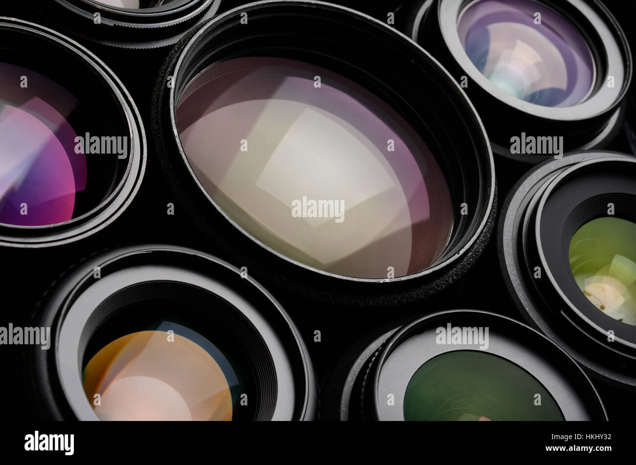 Set of black camera lens different sizes and colors macro shot Stock ...