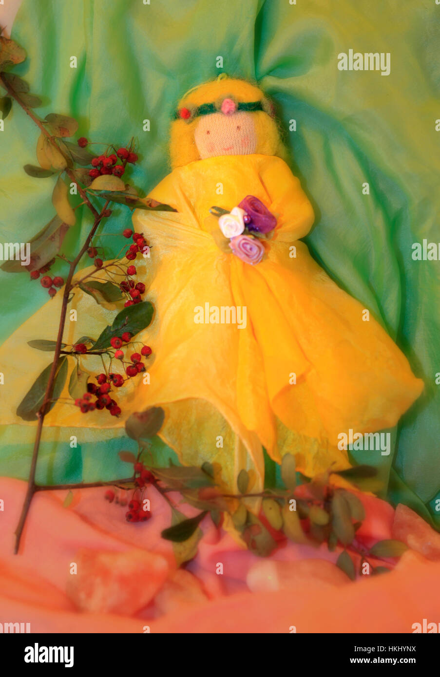 a spring doll with a bouquet of flowers Stock Photo - Alamy