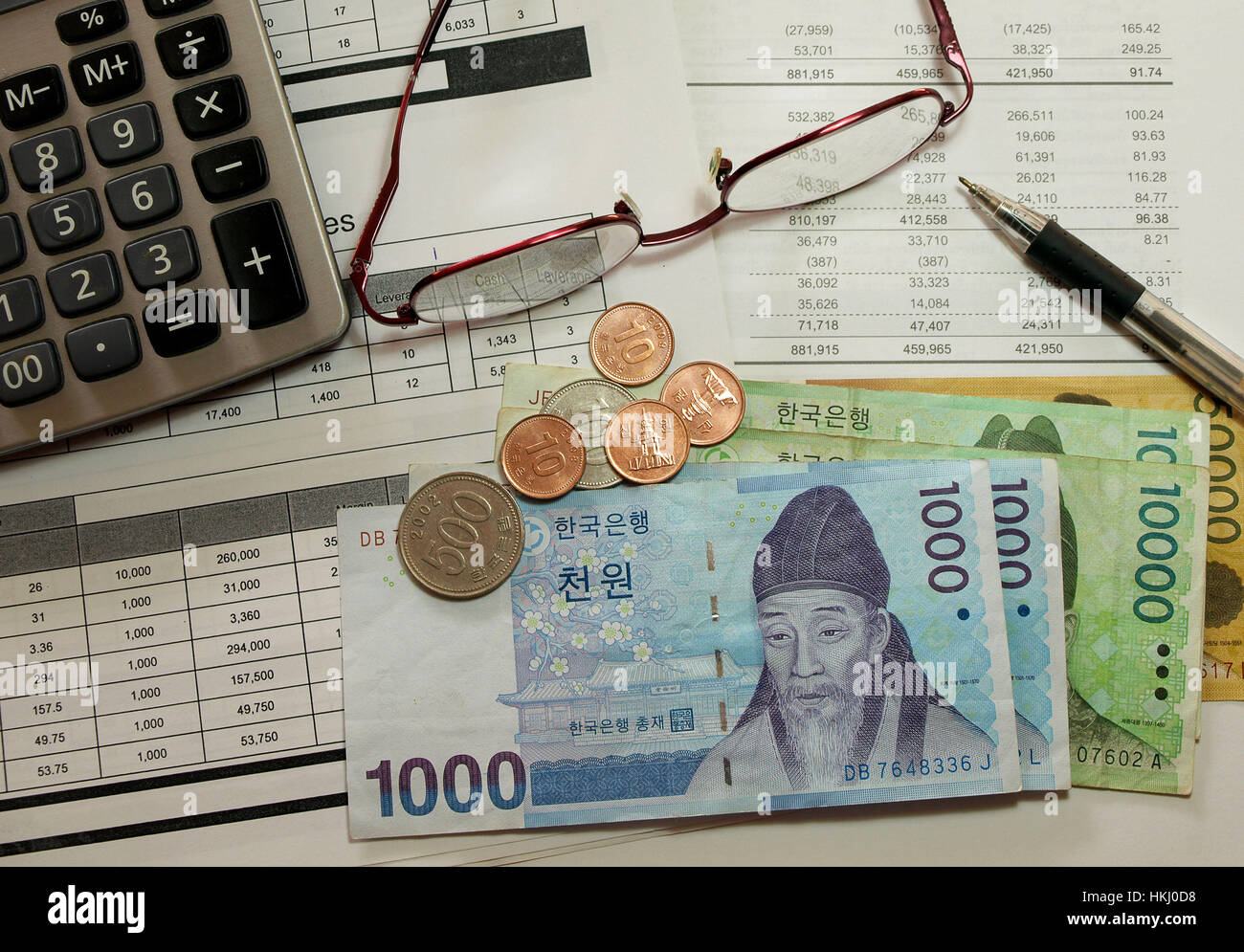 finance sheet with korean money and calculator as background Stock ...