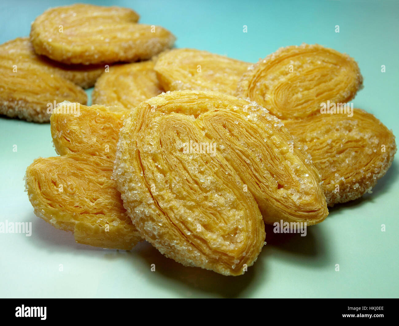 Palmier biscuits - french cookies made of puff pastry Stock Photo - Alamy