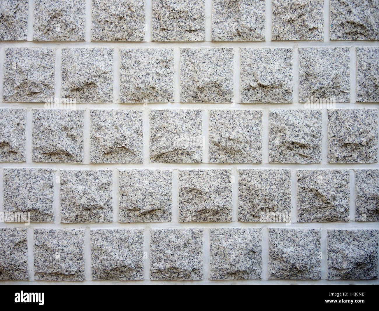 The wall of gray rectangular stones as background Stock Photo - Alamy