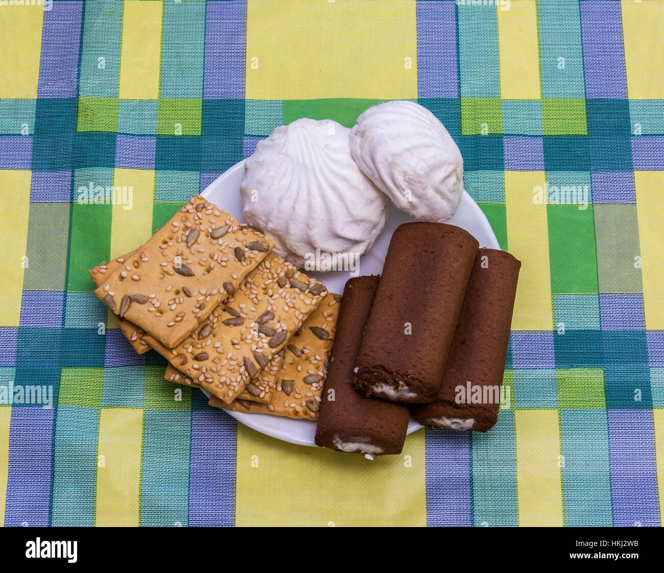 Zephyr, biscuits and chocolate strawberries with cream Stock Photo - Alamy