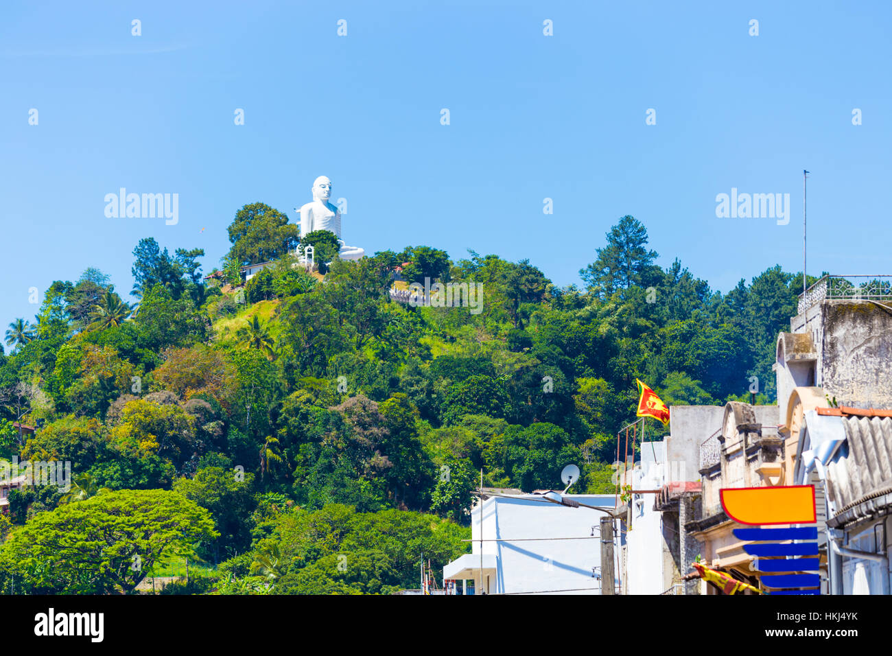 The distant, white Bahiravokanda Vihara Buddha Statue seen from below ...