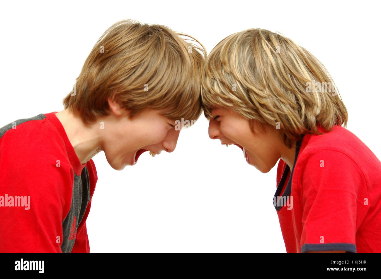 Boys shout each other Stock Photo - Alamy