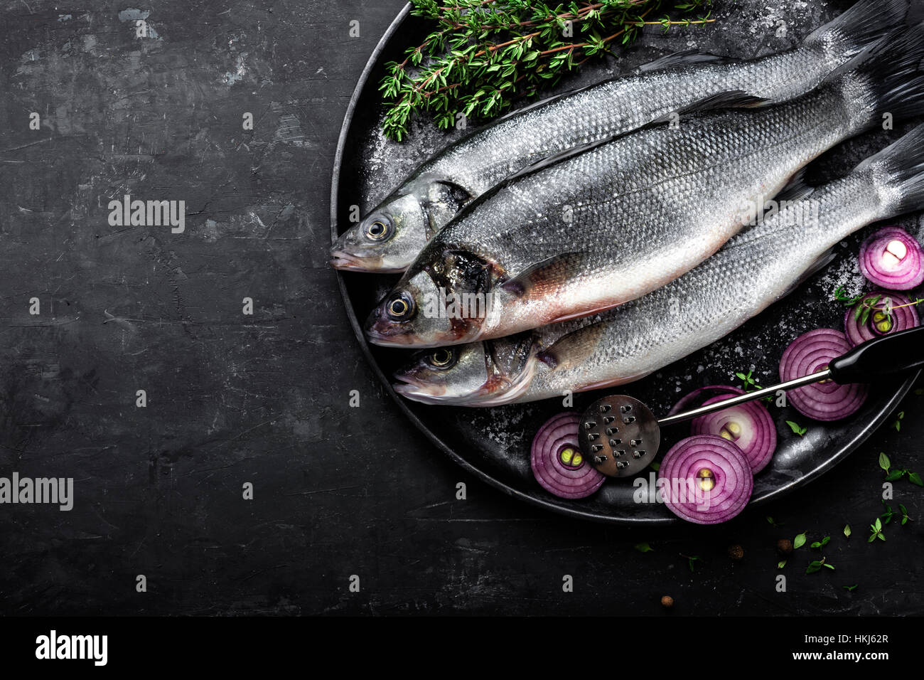 raw sea bass fish Stock Photo - Alamy
