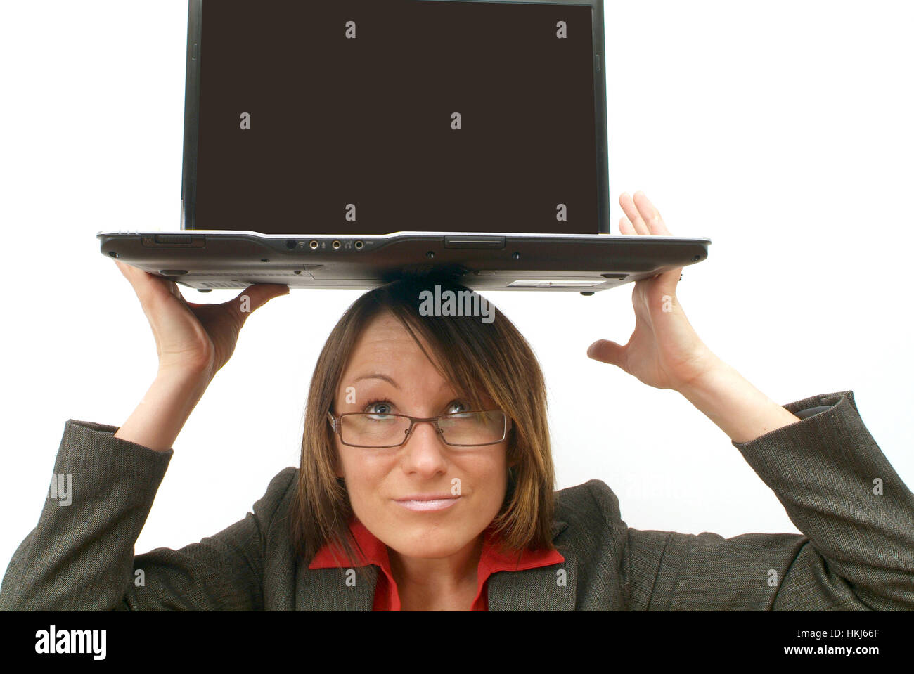 Young business woman with laptop on head Stock Photo - Alamy