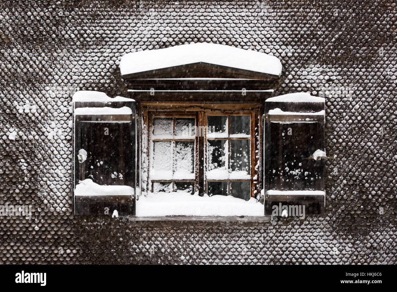 Snow-covered window on old farmhouse, Hittisau, Bregenz Forest ...