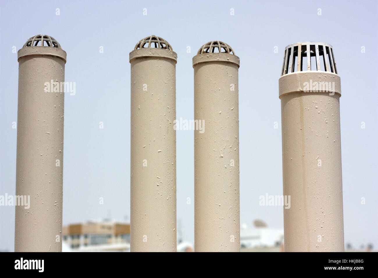 Four ventilator pipes Stock Photo - Alamy