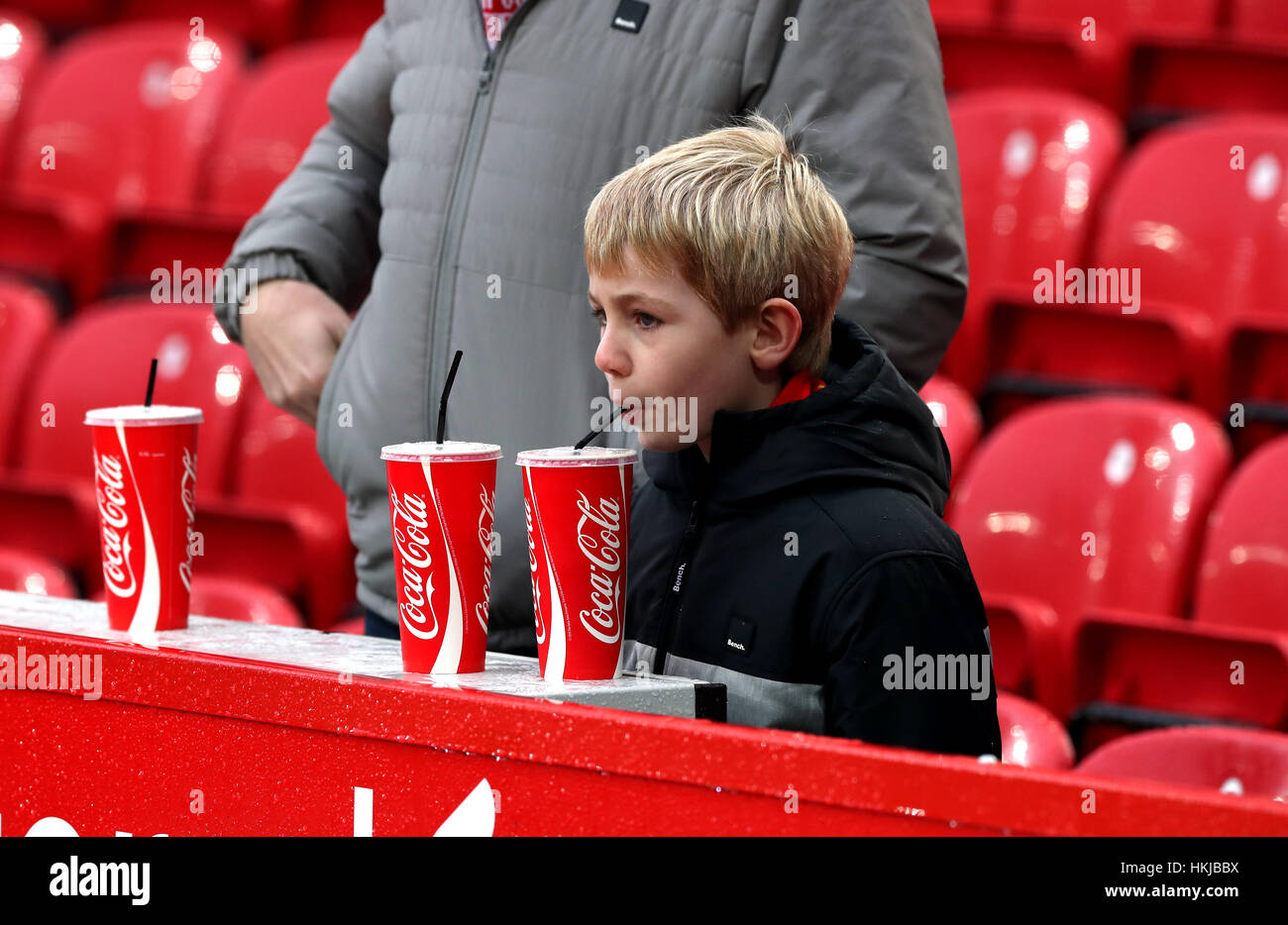 A young fan has a drink before the Emirates FA Cup, fourth round match ...